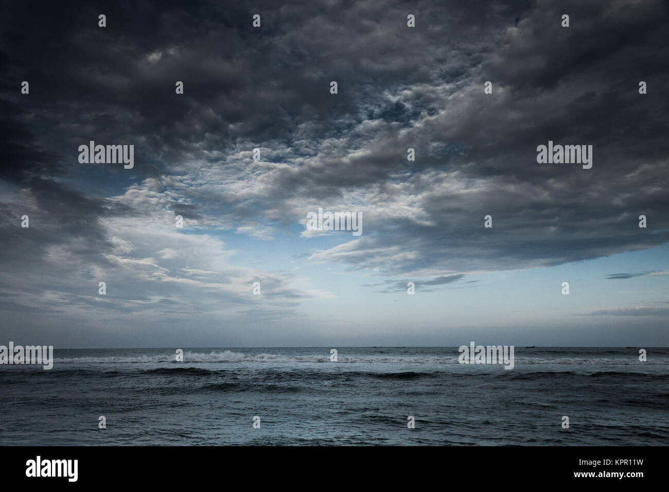 Dramatic sky with dark clouds over the ocean Stock Photo - Alamy