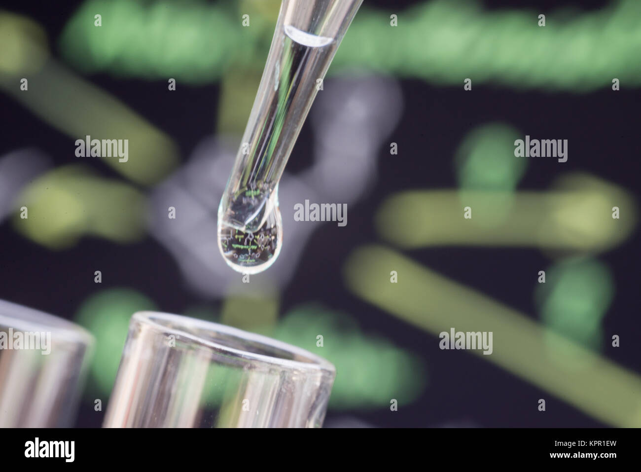 Liquid drop on test tube Stock Photo - Alamy