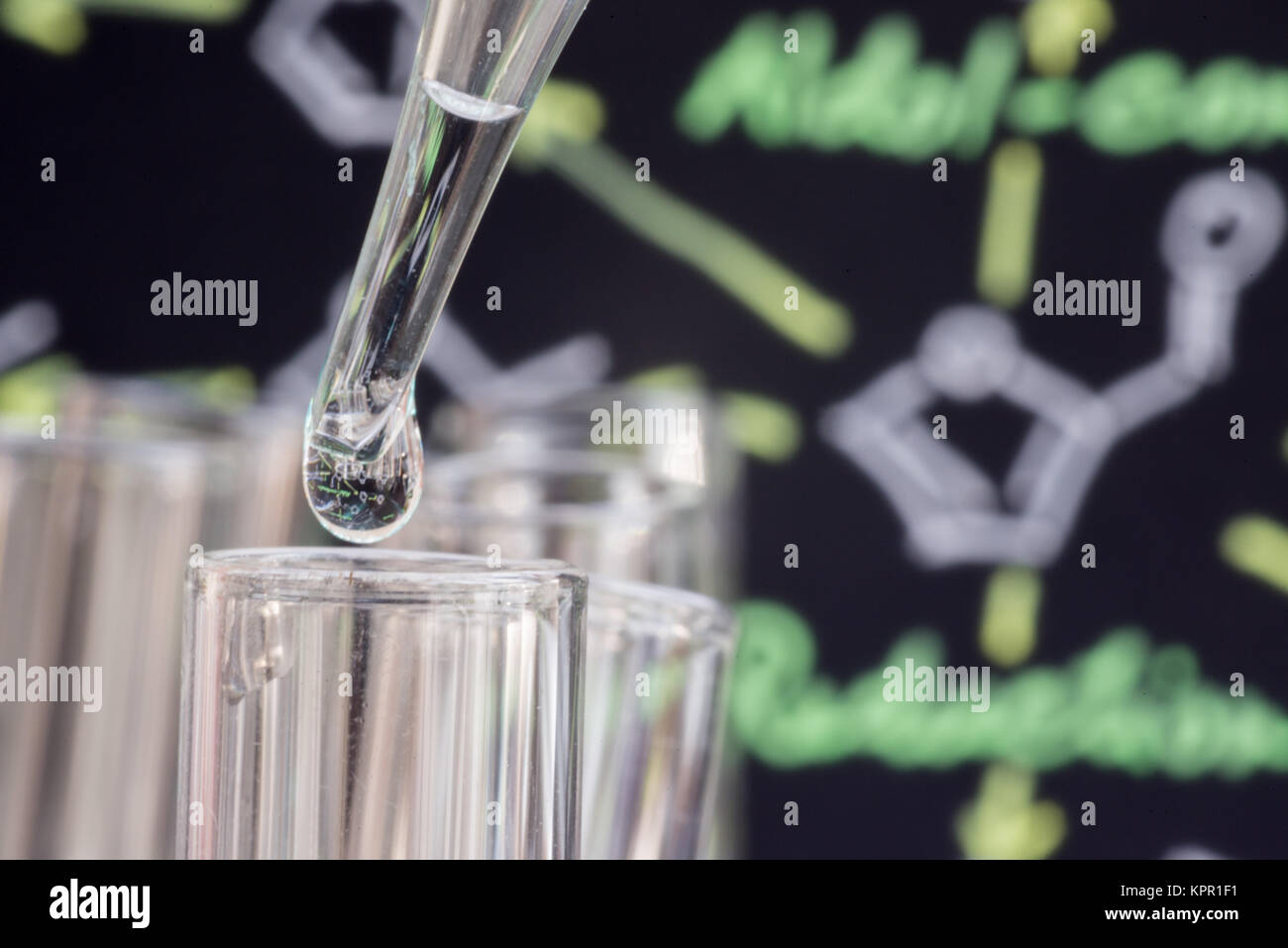 Liquid drop on test tube Stock Photo - Alamy