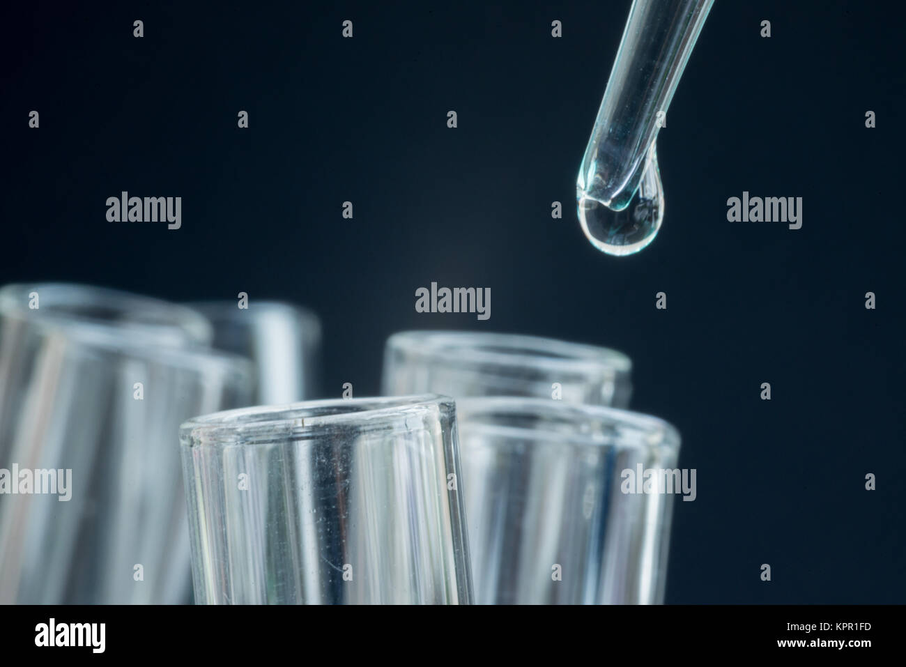 Liquid drop on test tube Stock Photo - Alamy