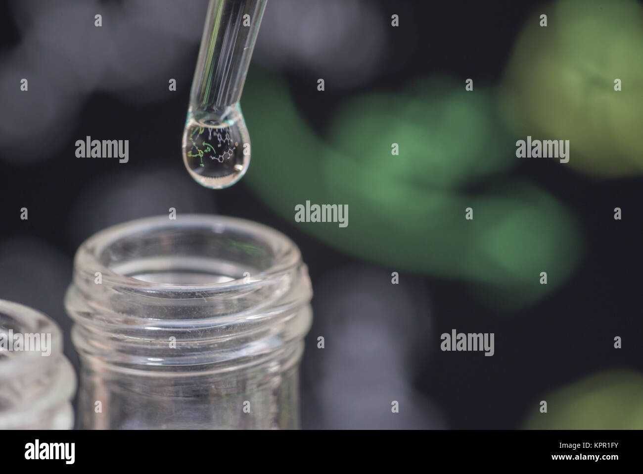 Liquid drop on test tube Stock Photo - Alamy