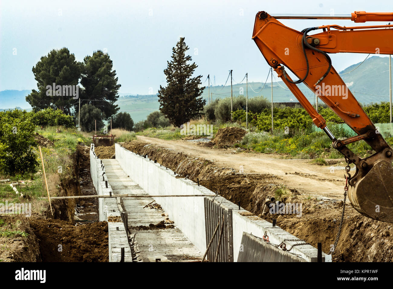 The excavator in activity Stock Photo - Alamy