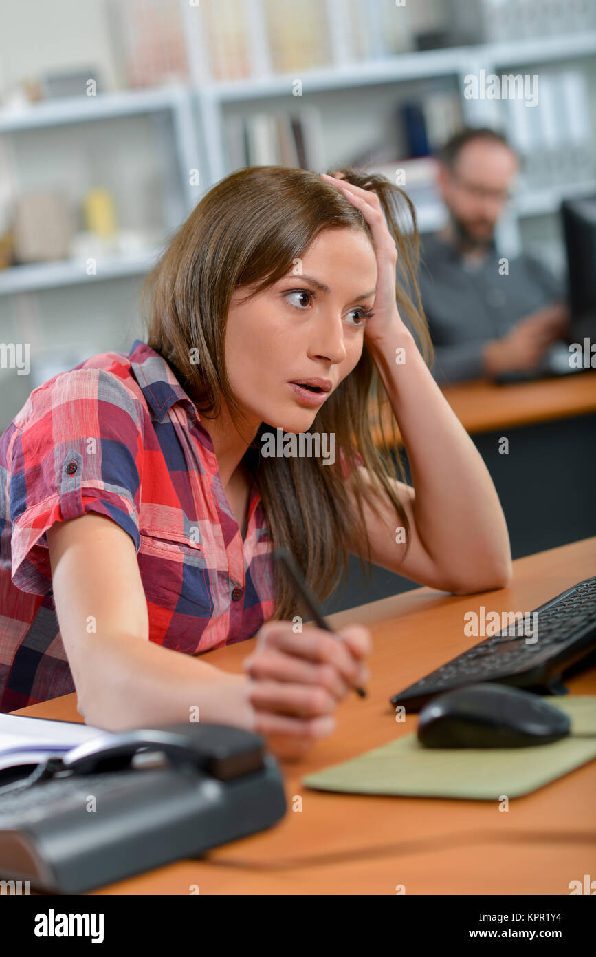 Shocked office worker Stock Photo - Alamy