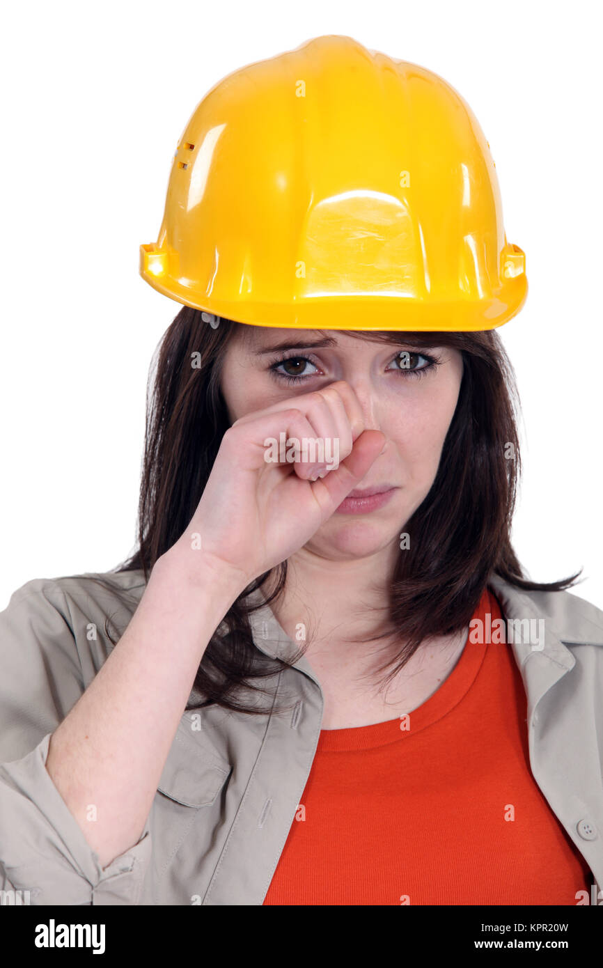 Female laborer crying Stock Photo - Alamy