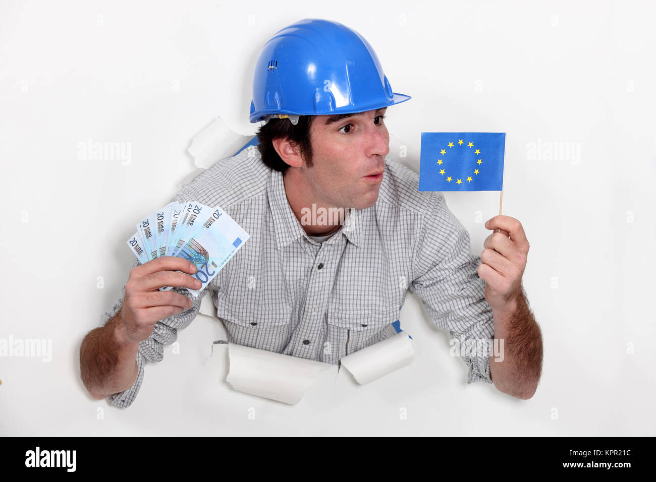 Craftsman holding european flag Stock Photo - Alamy