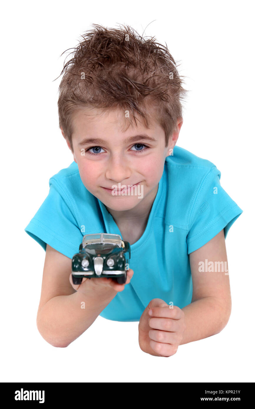 Little boy with toy car Stock Photo - Alamy
