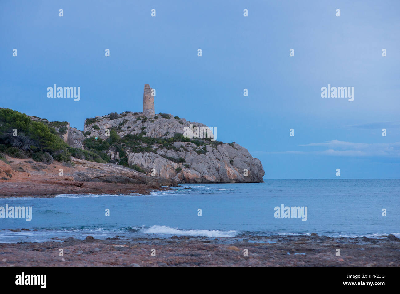 The calm sea in a very cloudy sunset in Spain Stock Photo - Alamy