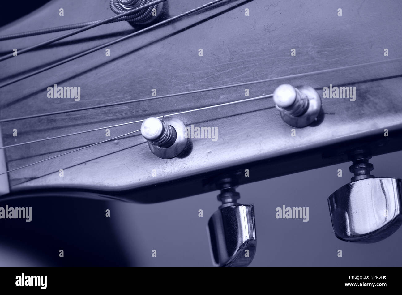 Guitar tuning pegs and posts on guitar head, macro Stock Photo - Alamy