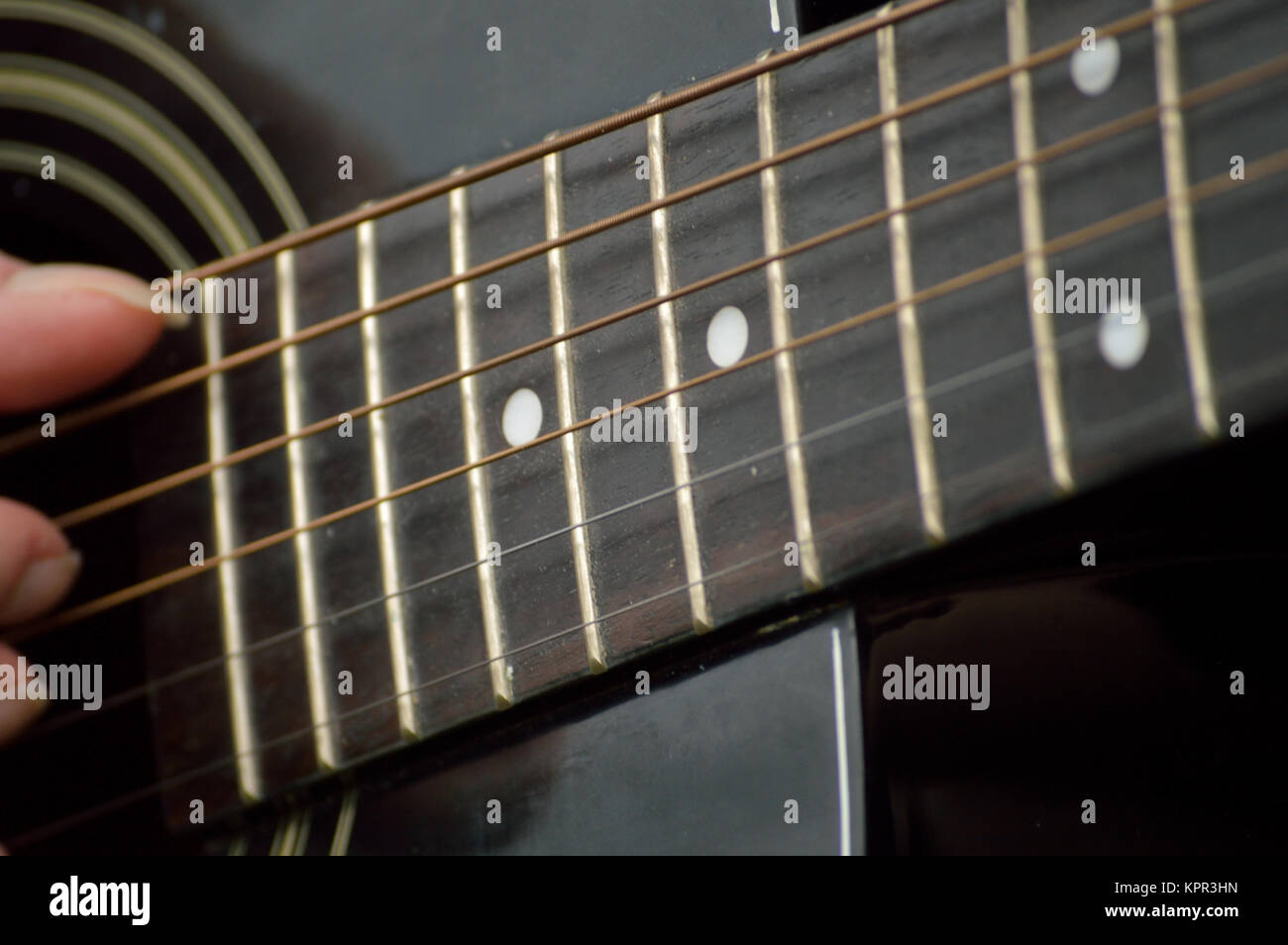 Guitar fretboard closeup Stock Photo - Alamy