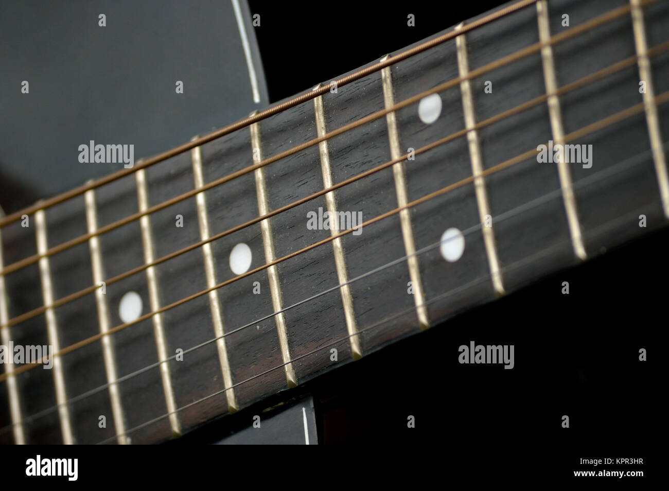 Guitar fretboard closeup Stock Photo - Alamy