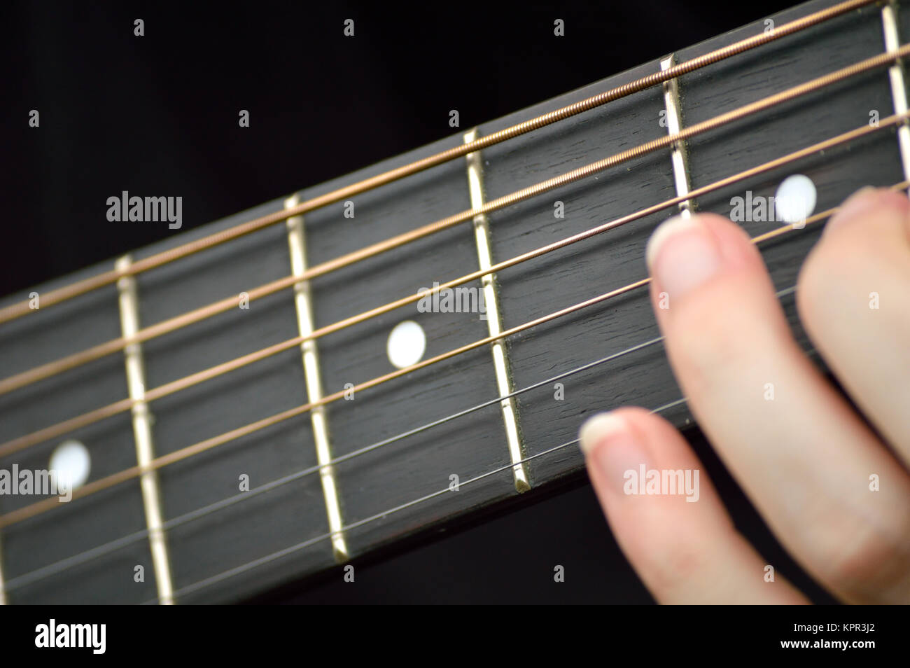 Guitar fretboard closeup Stock Photo - Alamy