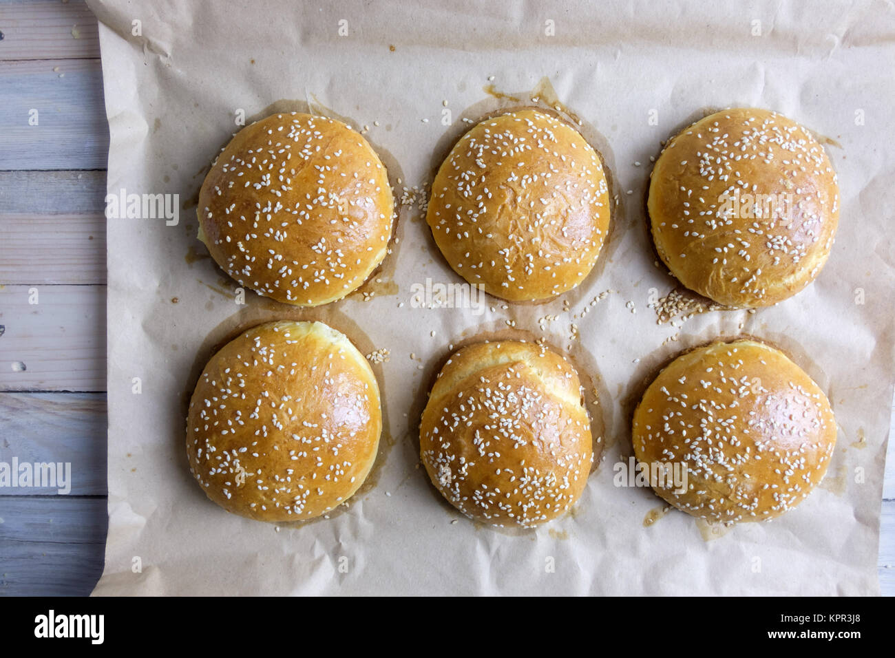 Homemade burger bun on parchment Stock Photo - Alamy