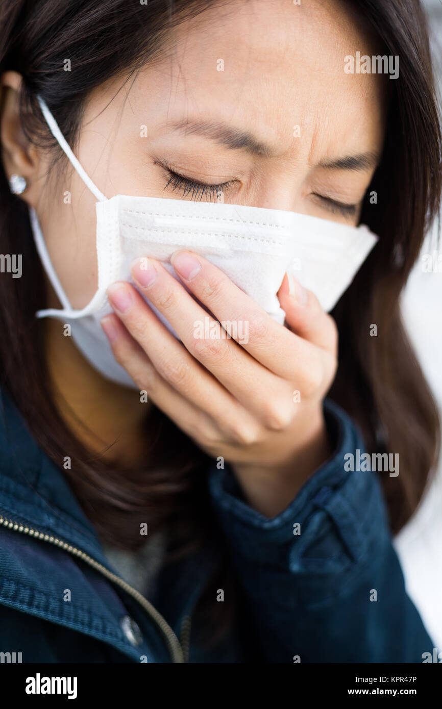 Yougn woman feeling unwell Stock Photo - Alamy