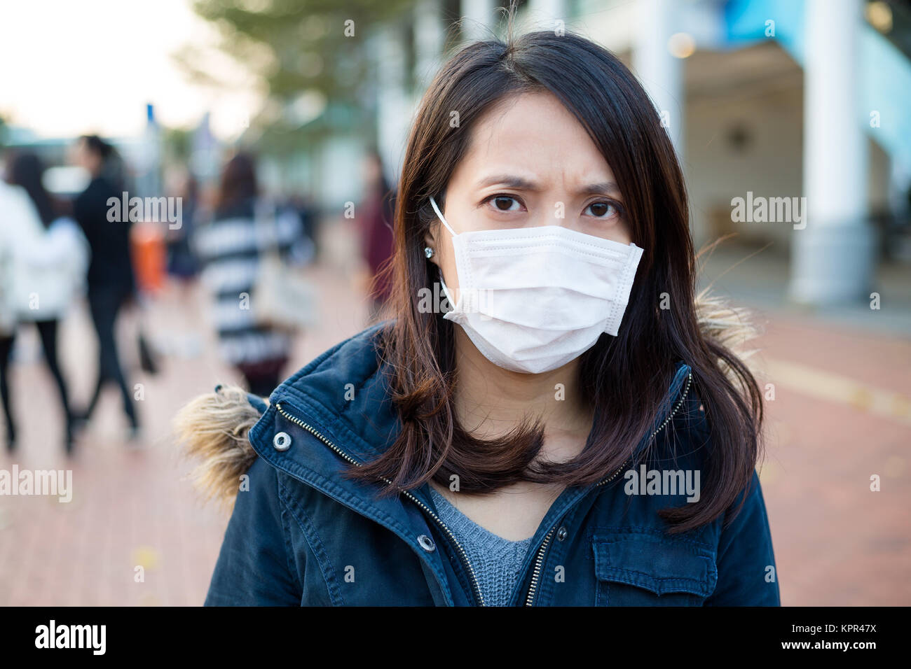 Woman wearing medical mask Stock Photo - Alamy