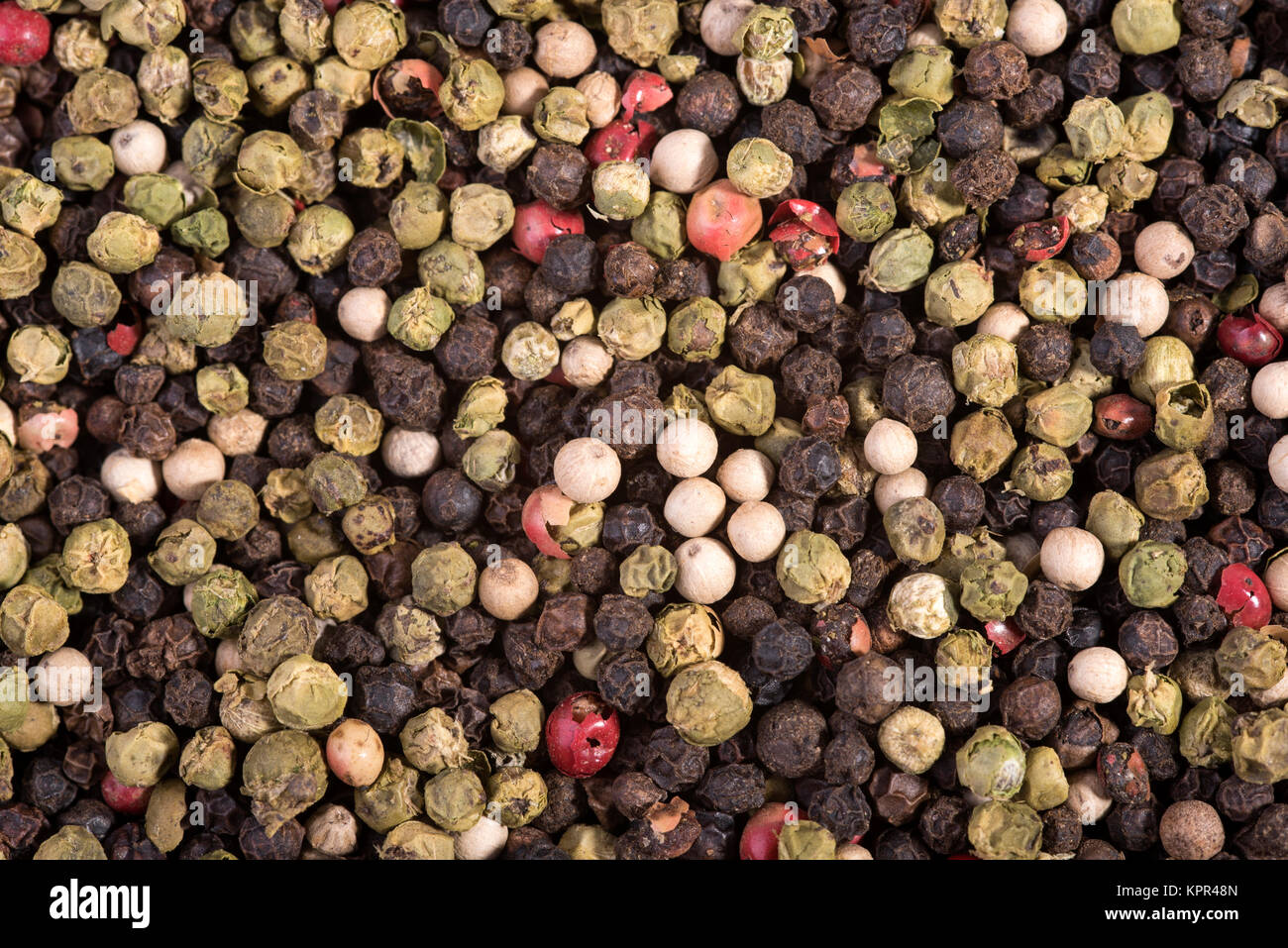 a picture of colorful peppercorns Stock Photo - Alamy