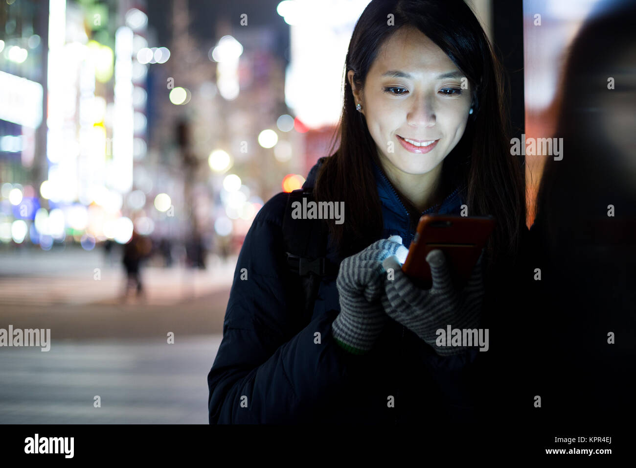 Woman use of smart phone at night Stock Photo - Alamy