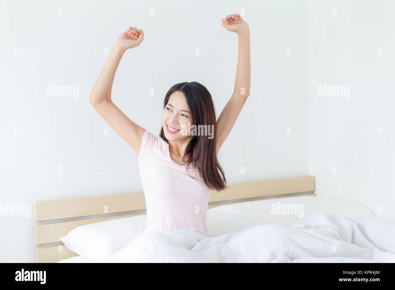 Young woman wake up at early morning Stock Photo - Alamy