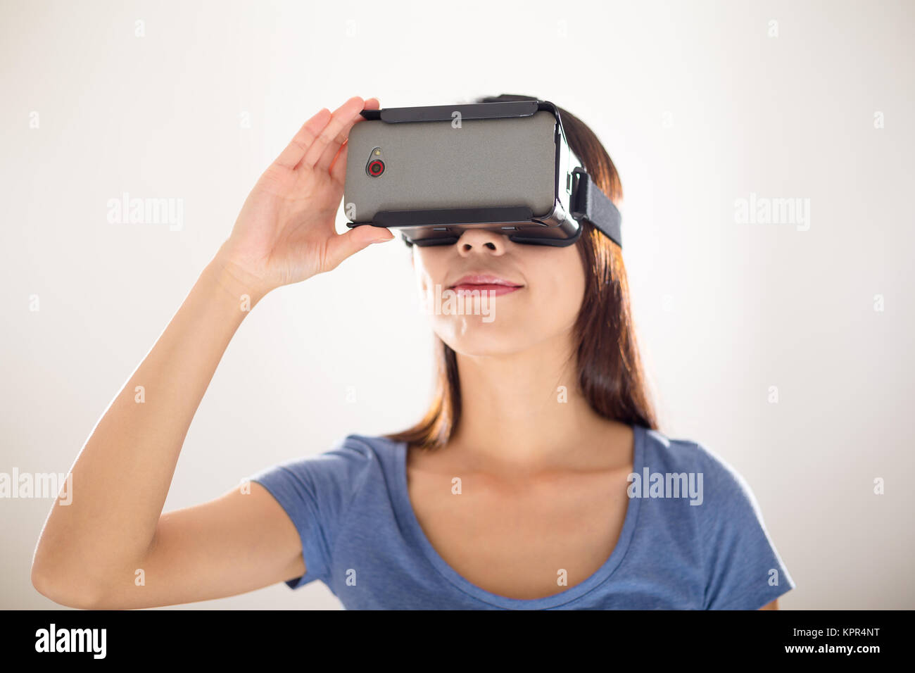 Female wearing VR device Stock Photo - Alamy