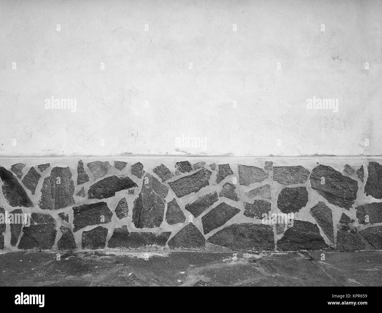 Wall with stones finish Stock Photo - Alamy