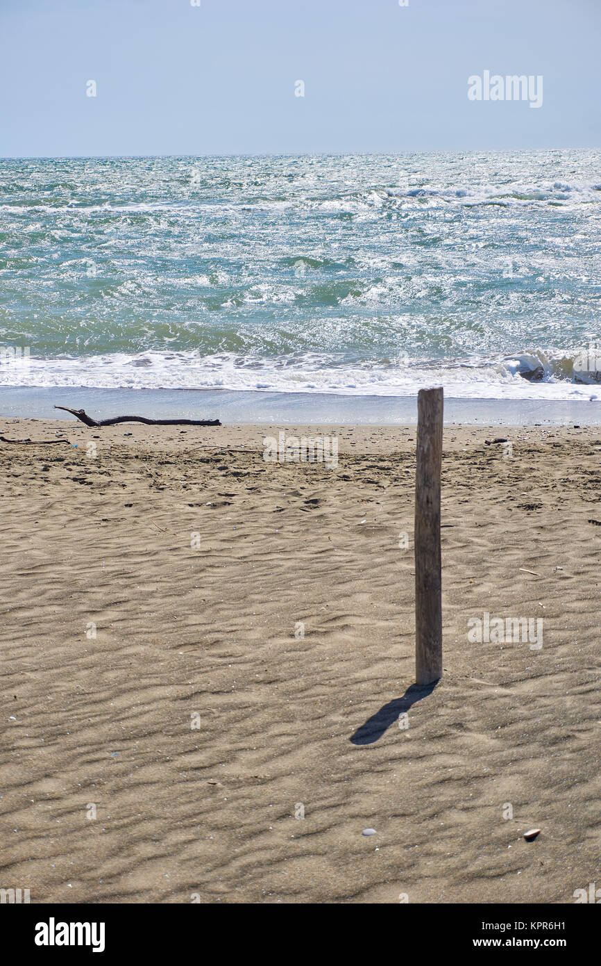 beach and blue sea with wooden post Stock Photo - Alamy