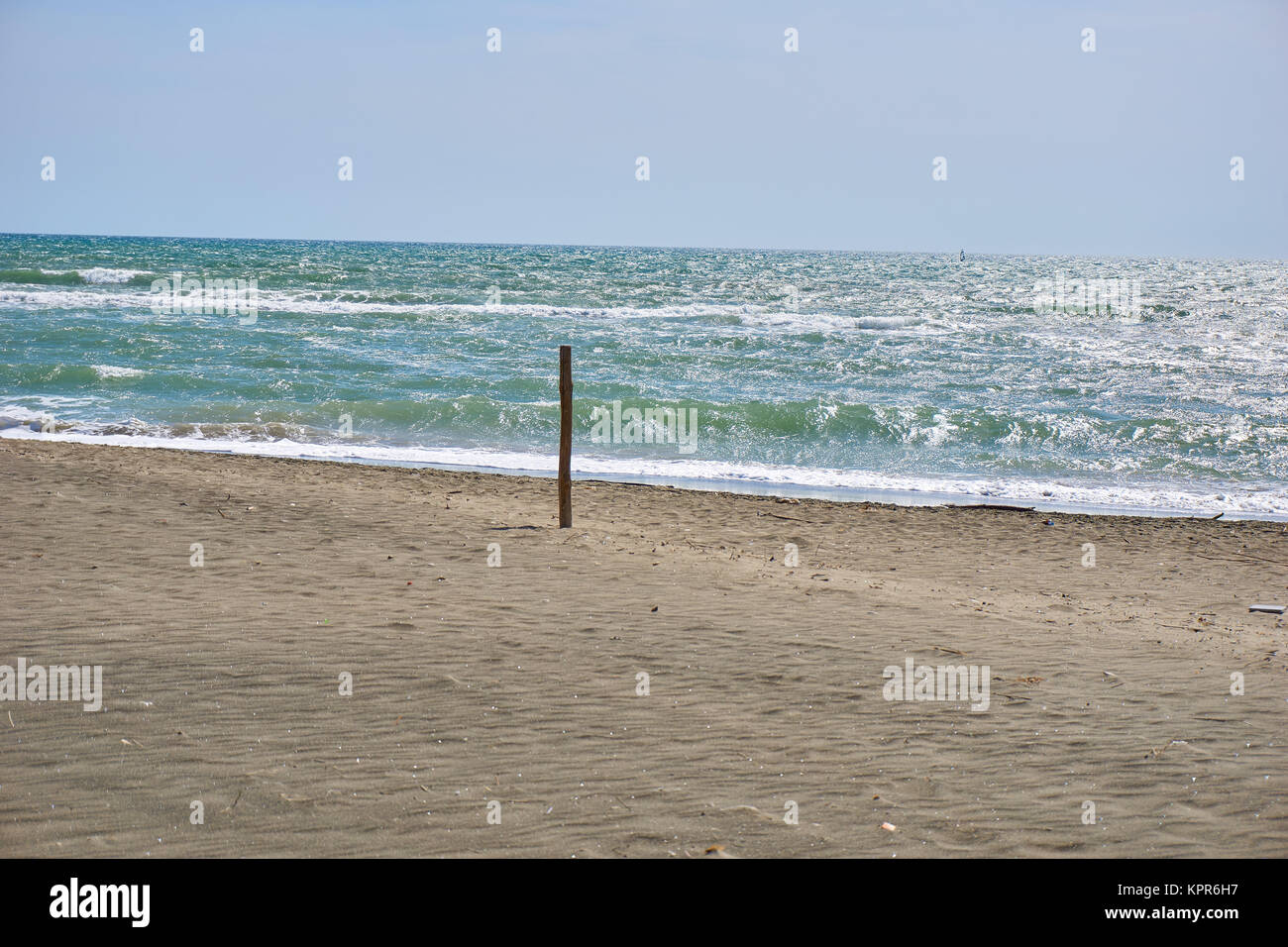 beach and blue sea with wooden post Stock Photo - Alamy