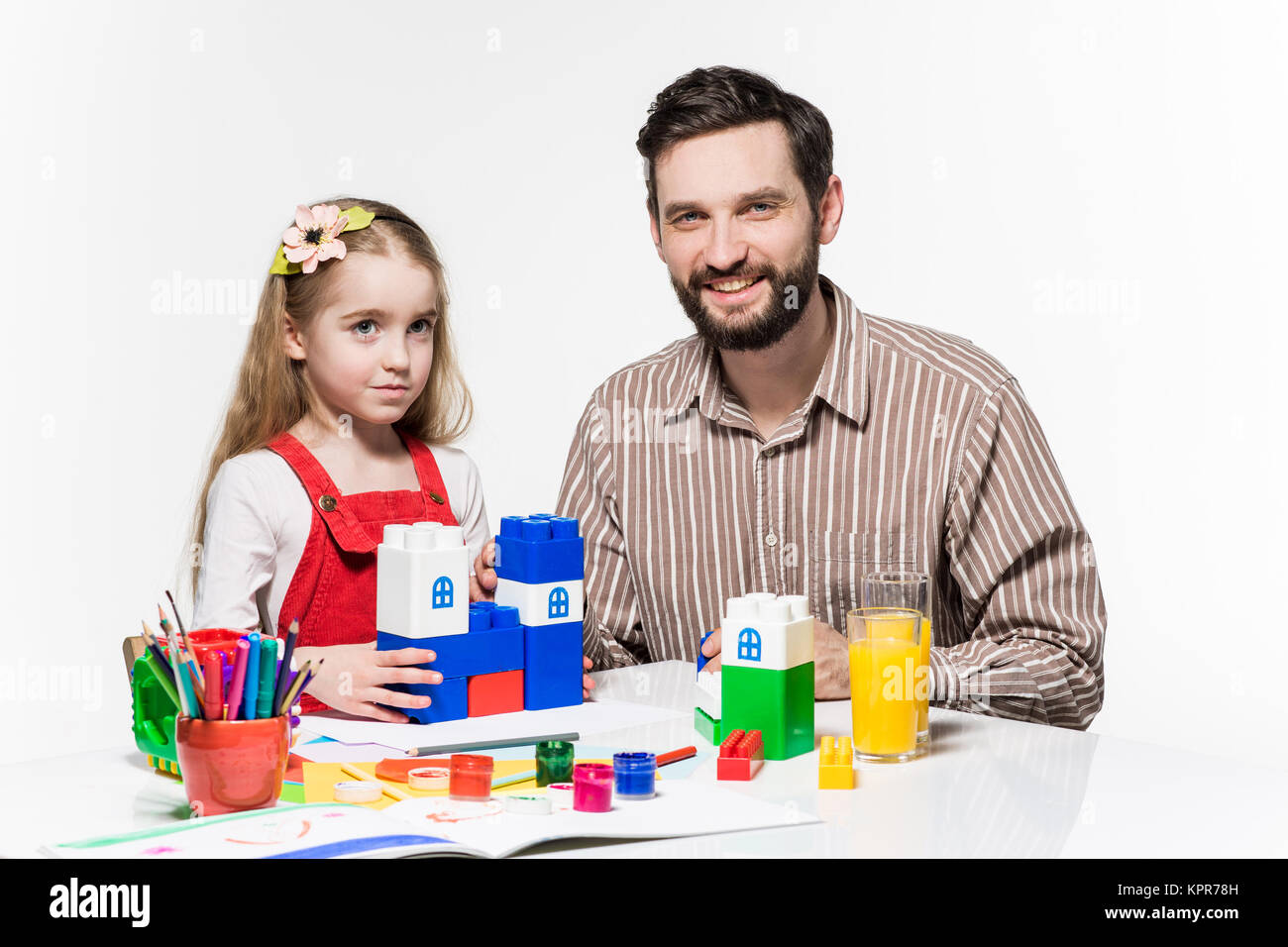 Father and daughter playing educational games together Stock Photo - Alamy