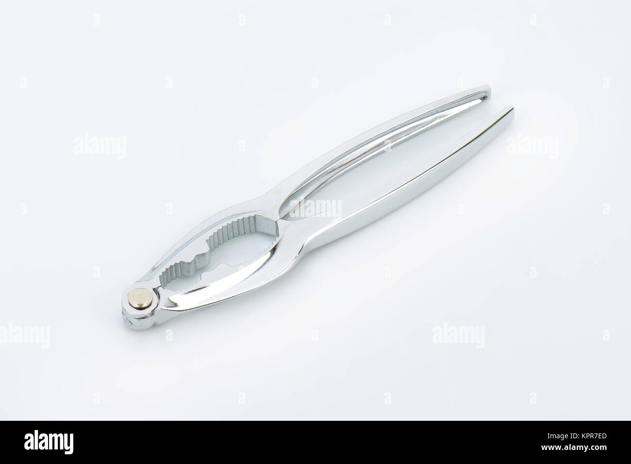 metal nut cracker Stock Photo - Alamy