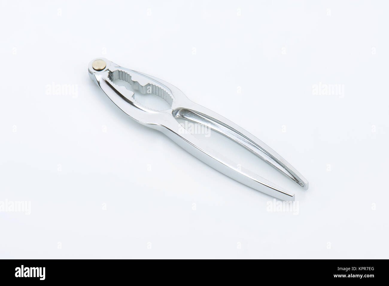 metal nut cracker Stock Photo - Alamy