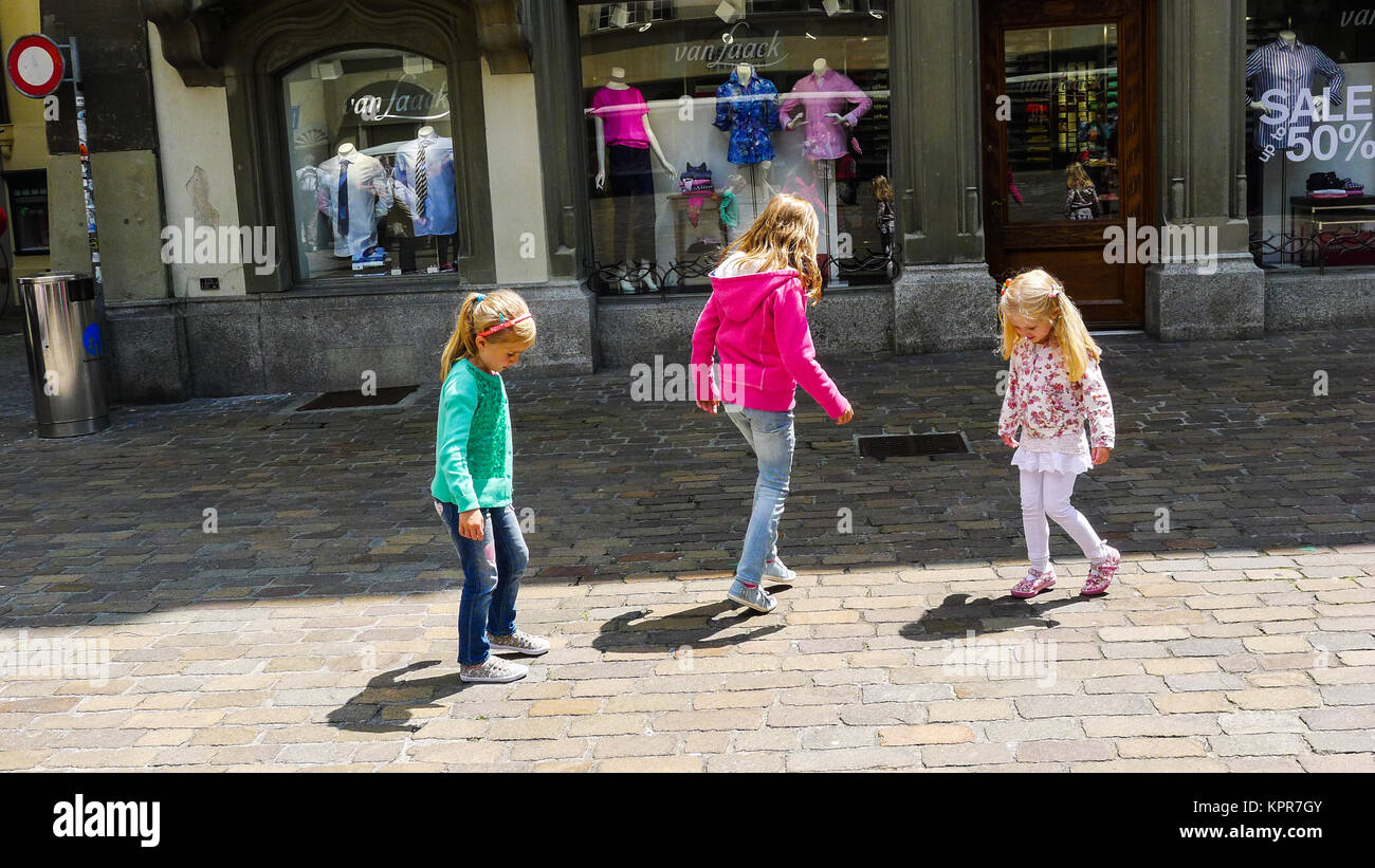 Children chasing shadows hi-res stock photography and images - Alamy