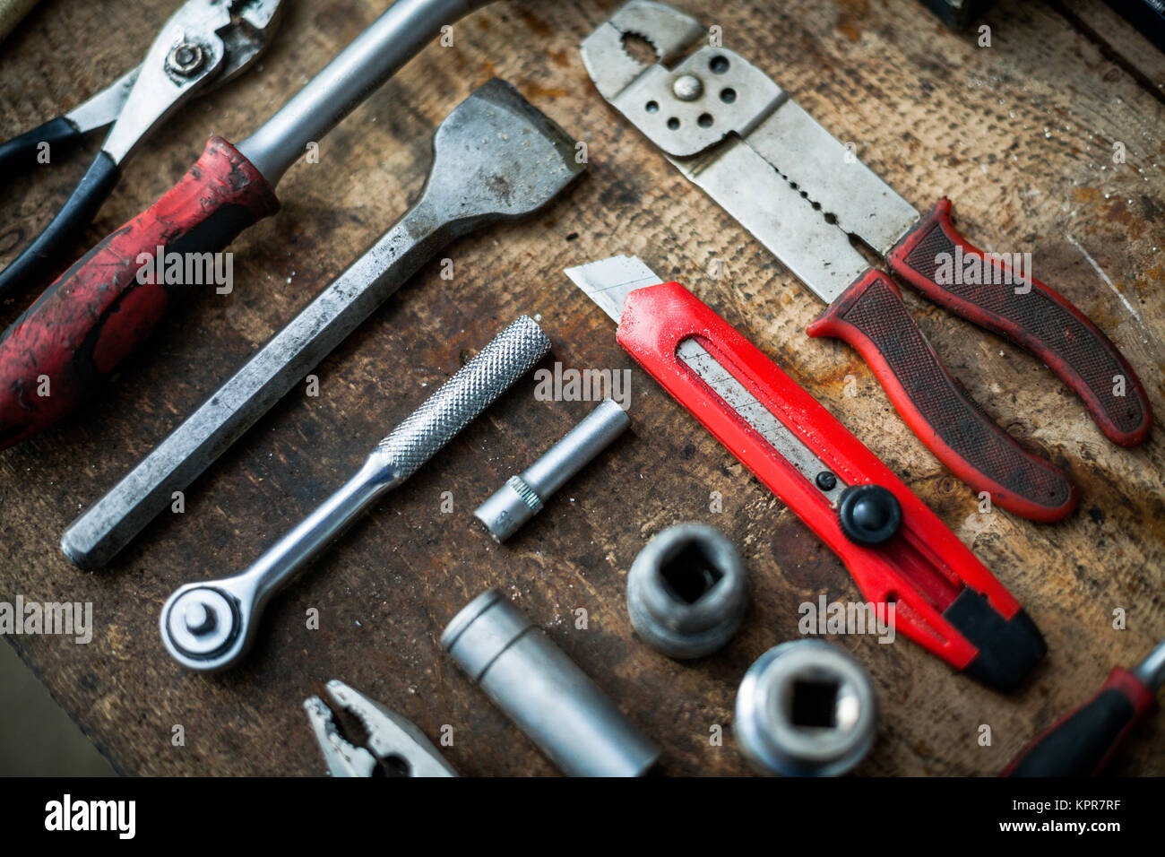 Tools on wooden plank Stock Photo - Alamy