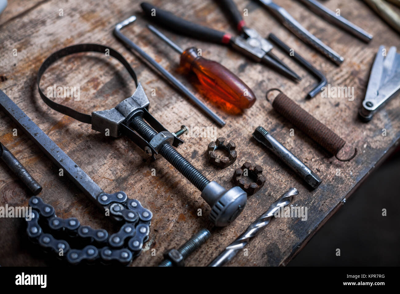 Tools on wooden plank Stock Photo - Alamy