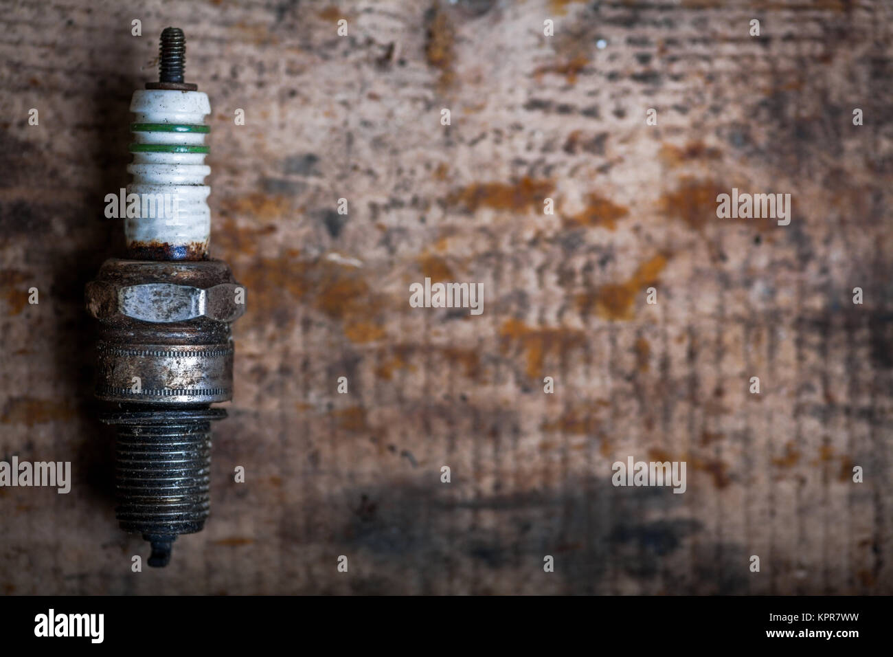 Used spark plug Stock Photo - Alamy