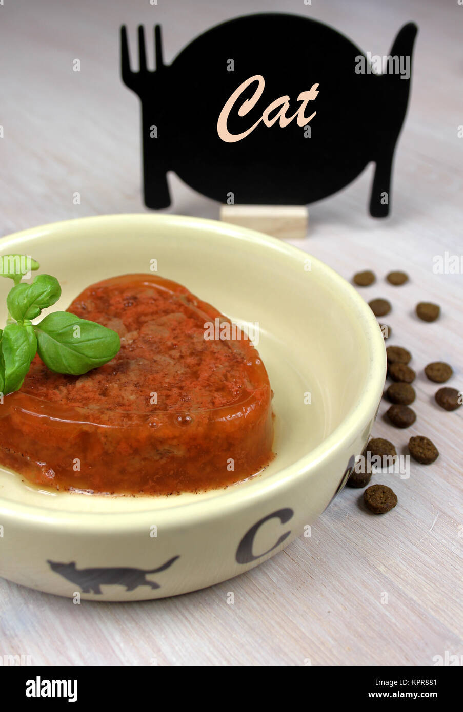 Cat food bowl with table "Cat Stock Photo - Alamy