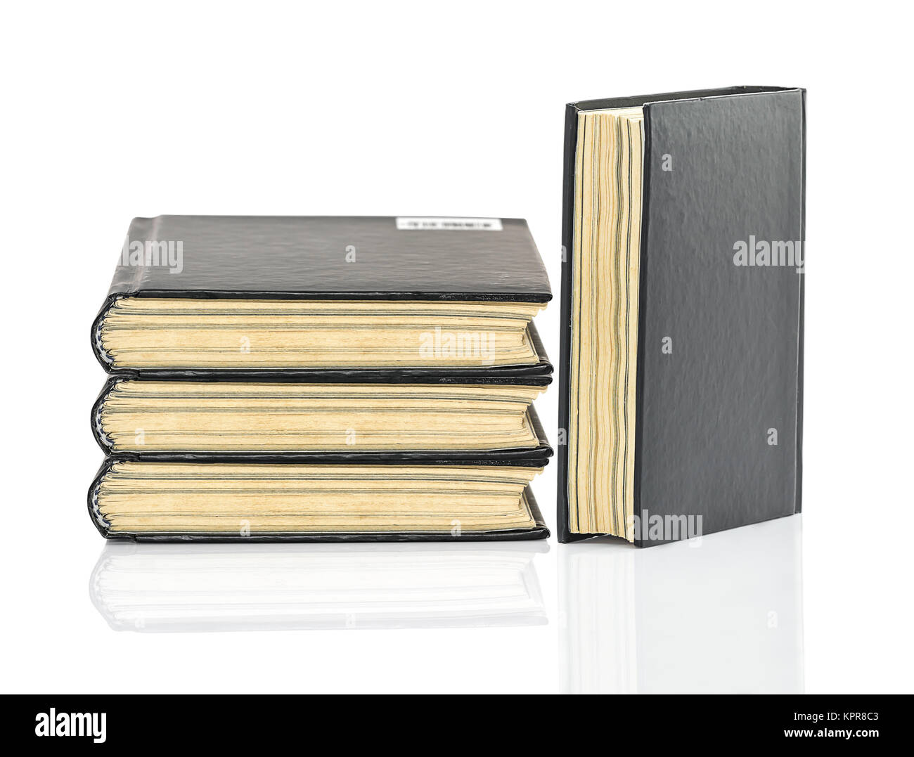 Black hardcover book on white glossy background Stock Photo - Alamy