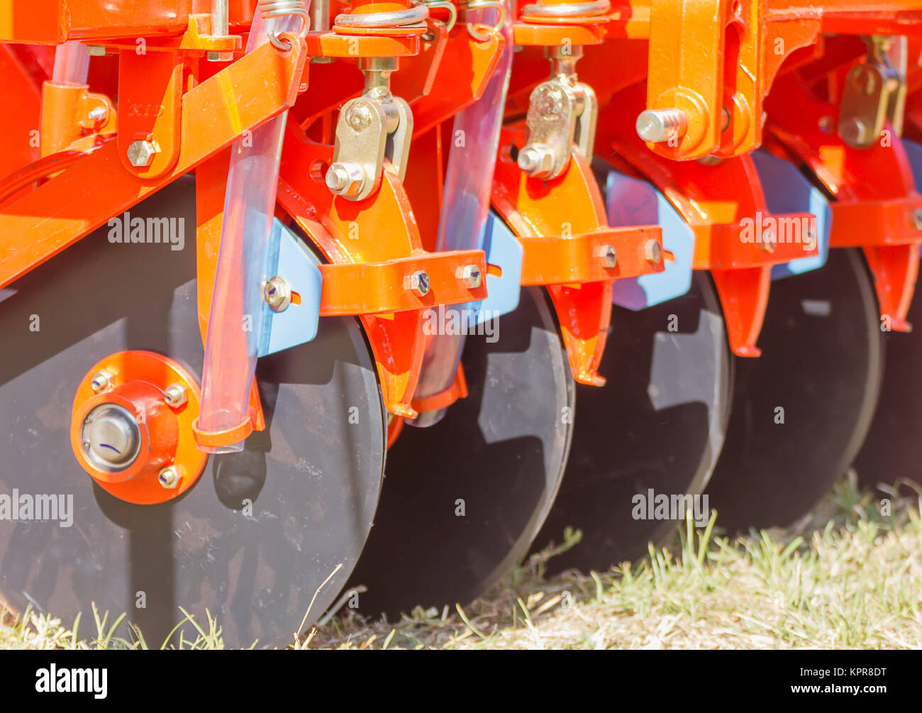 Close up new tractor plow Stock Photo - Alamy