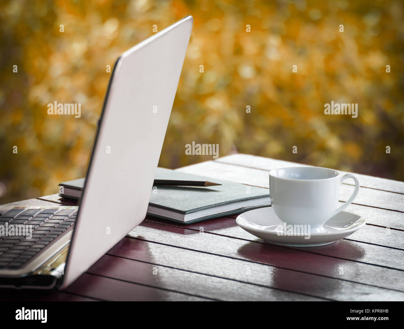 Laptop and Cup of coffee on desk Stock Photo - Alamy