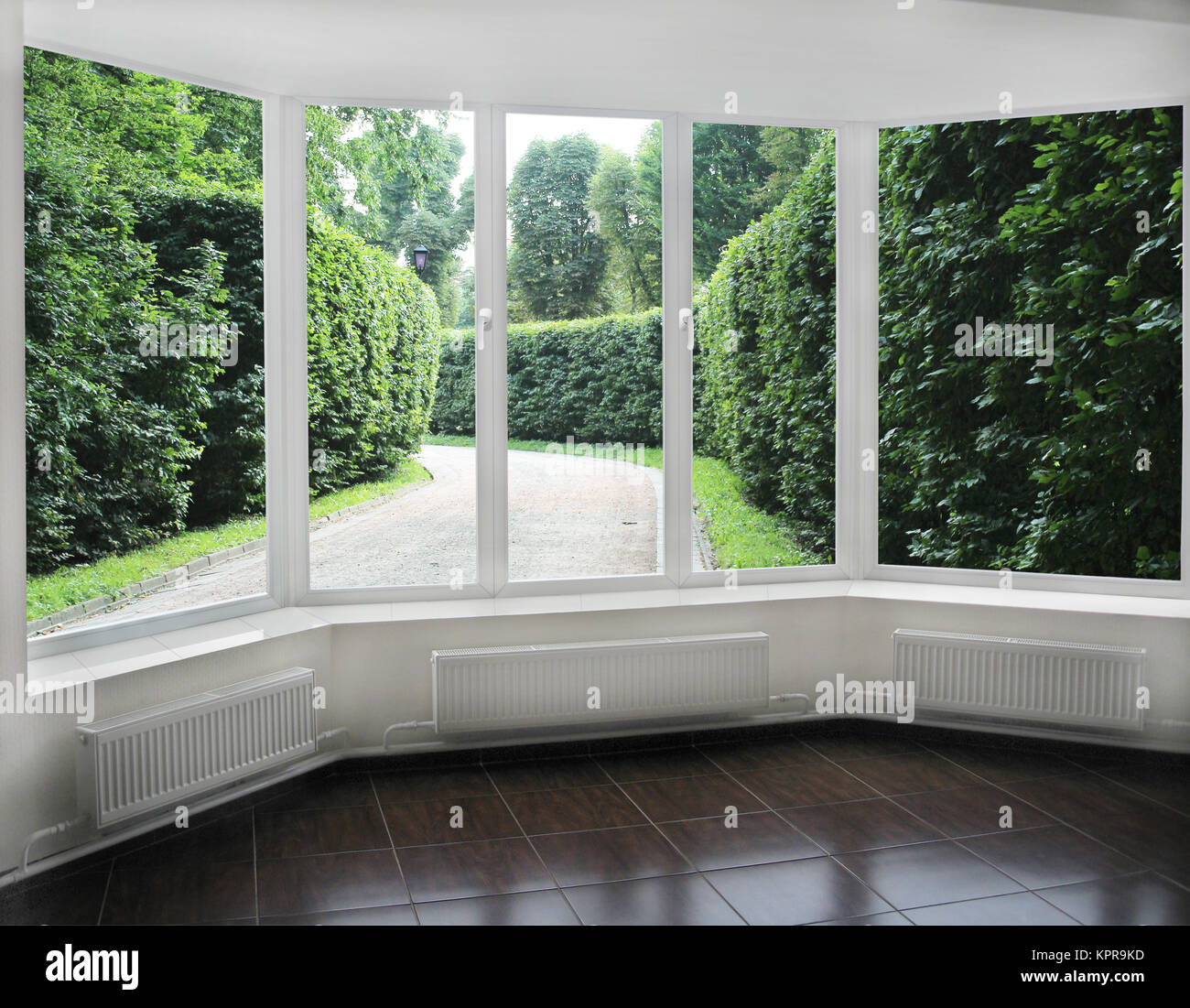 windows overlooking the city park Stock Photo - Alamy