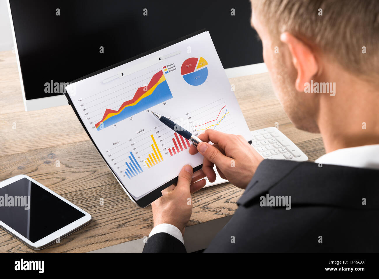 Close-up Of A Businessman Analyzing Graph Stock Photo - Alamy