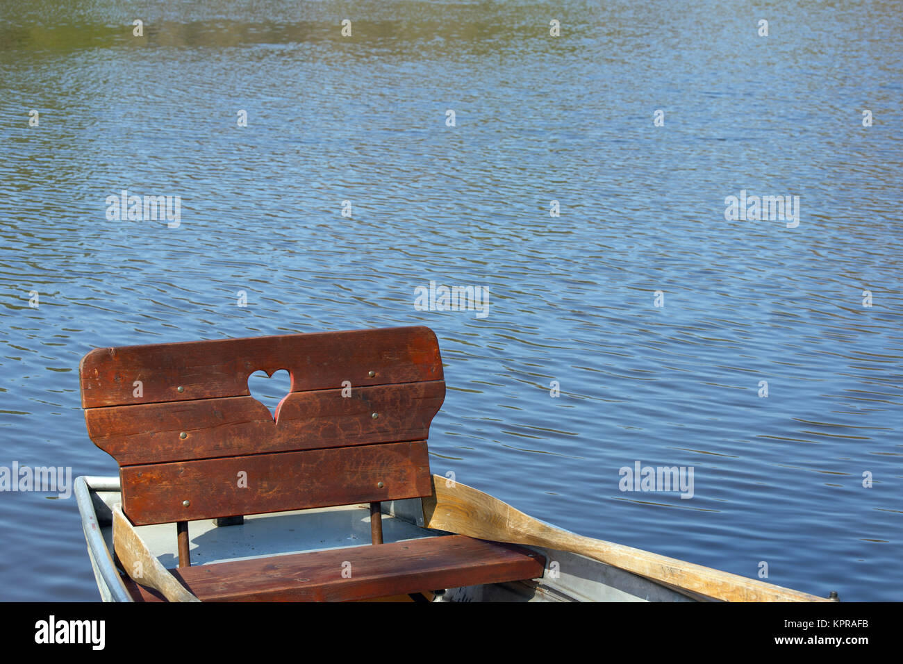 Rowing boat with heart at a lake Stock Photo - Alamy