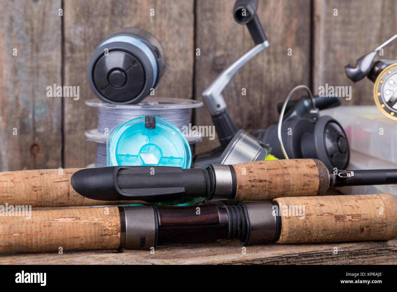 fishing tackles on vertical wooden board background Stock Photo - Alamy