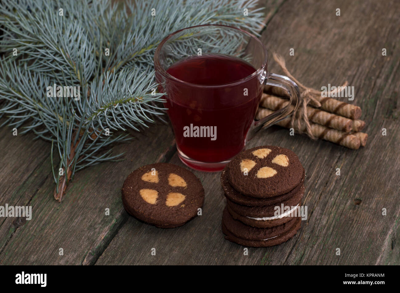 the transparent mug of red tea decorated with a fir-tree branch Stock ...