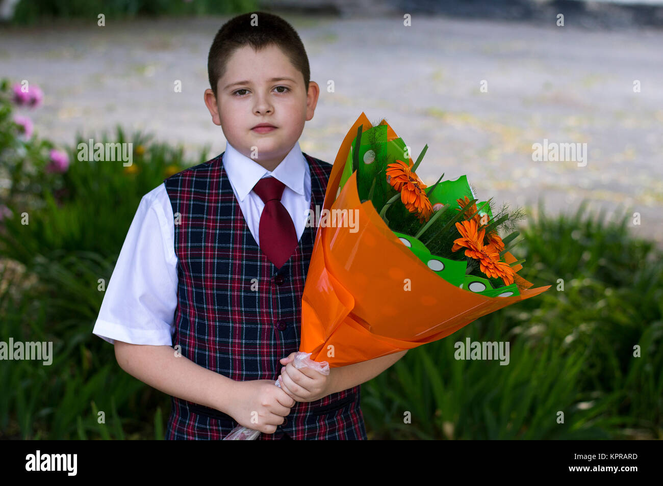 the lovely school student with a beautiful bouquet of flowers Stock ...