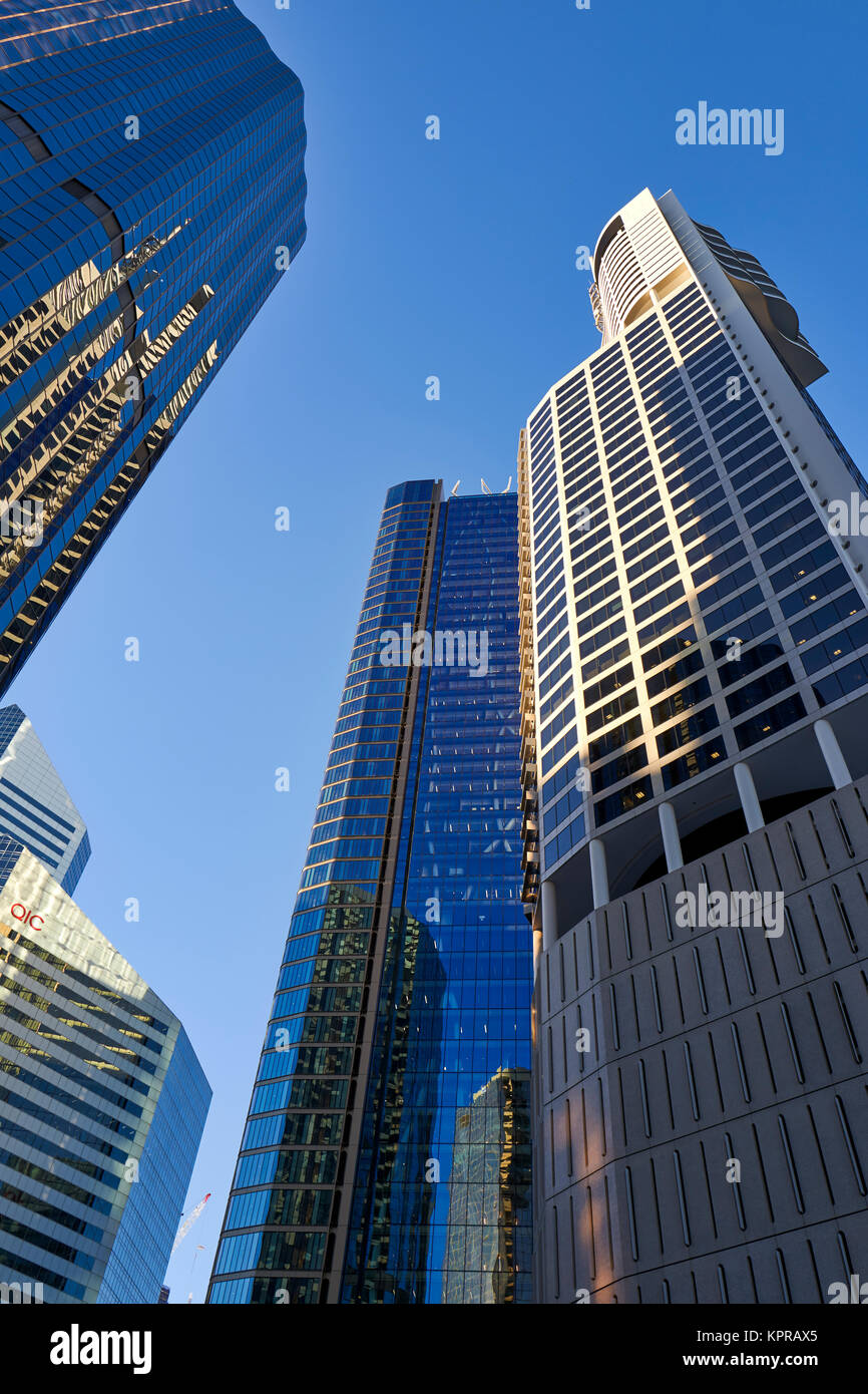 Modern high-rise buildings at Eagle Street Pier beside river in ...