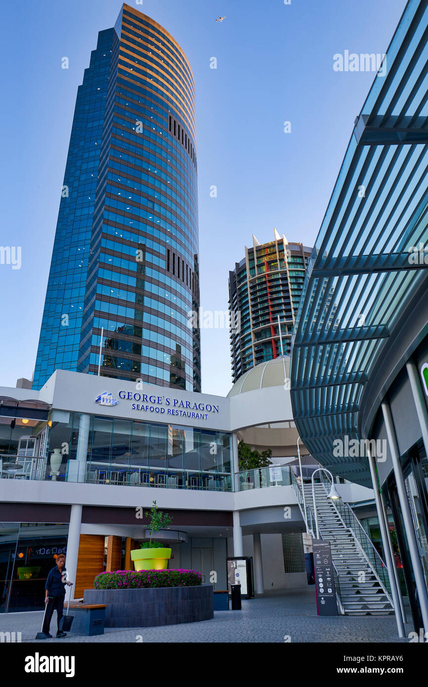 Modern high-rise buildings at Eagle Street Pier beside river in ...