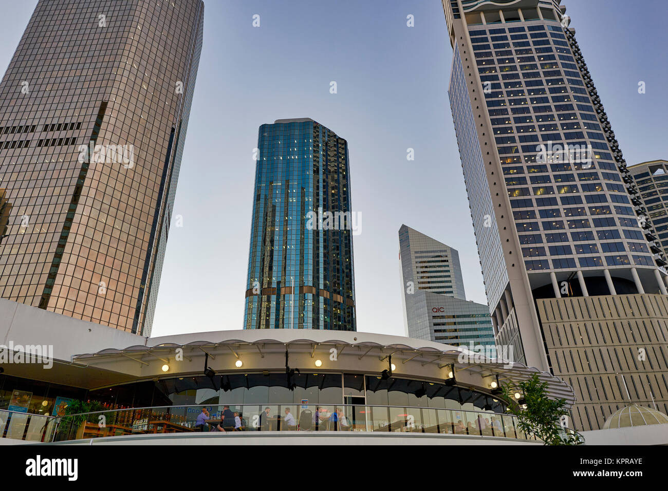 Modern high-rise buildings at Eagle Street Pier beside river in ...