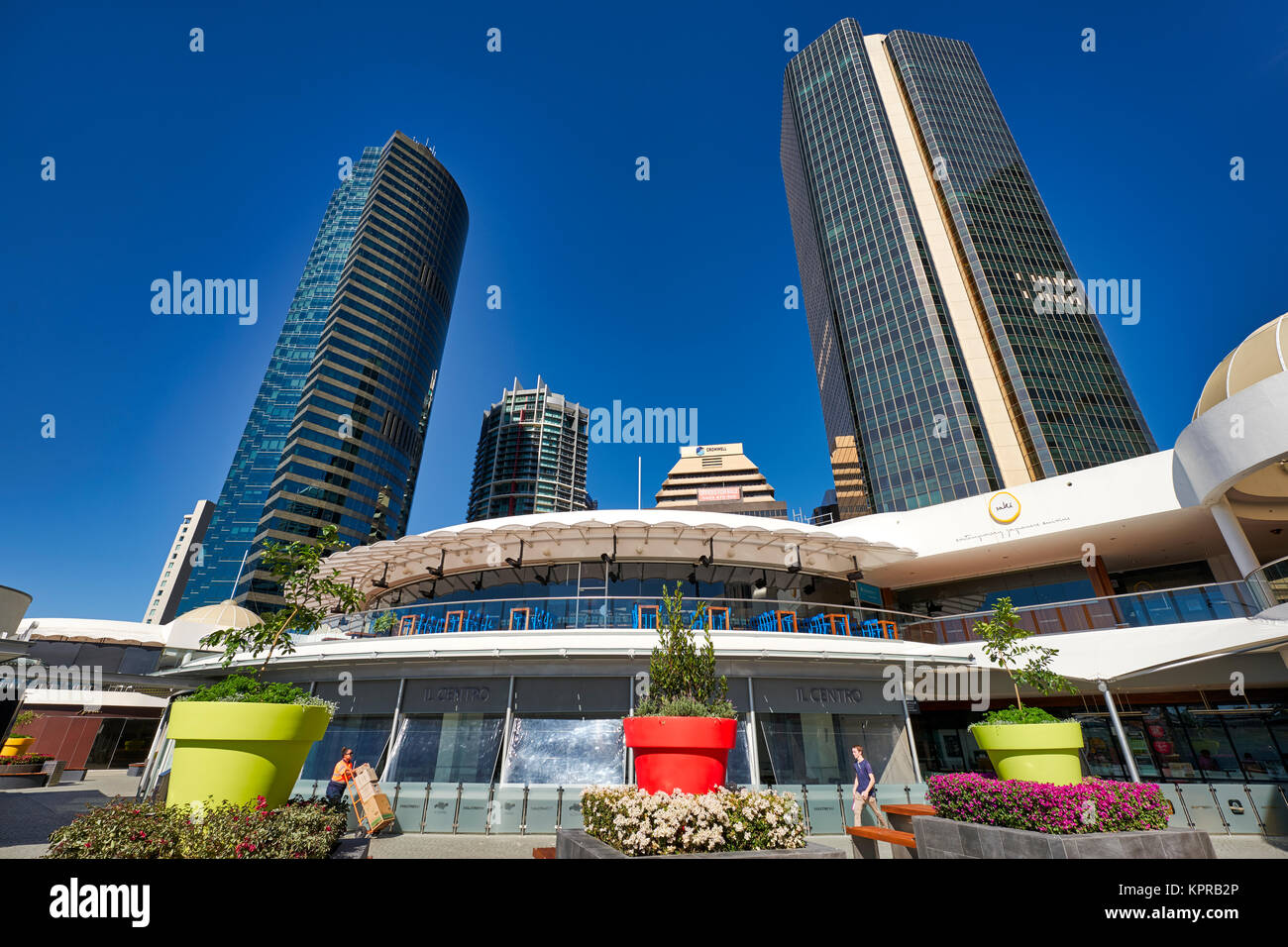 Modern high-rise buildings at Eagle Street Pier beside river in ...
