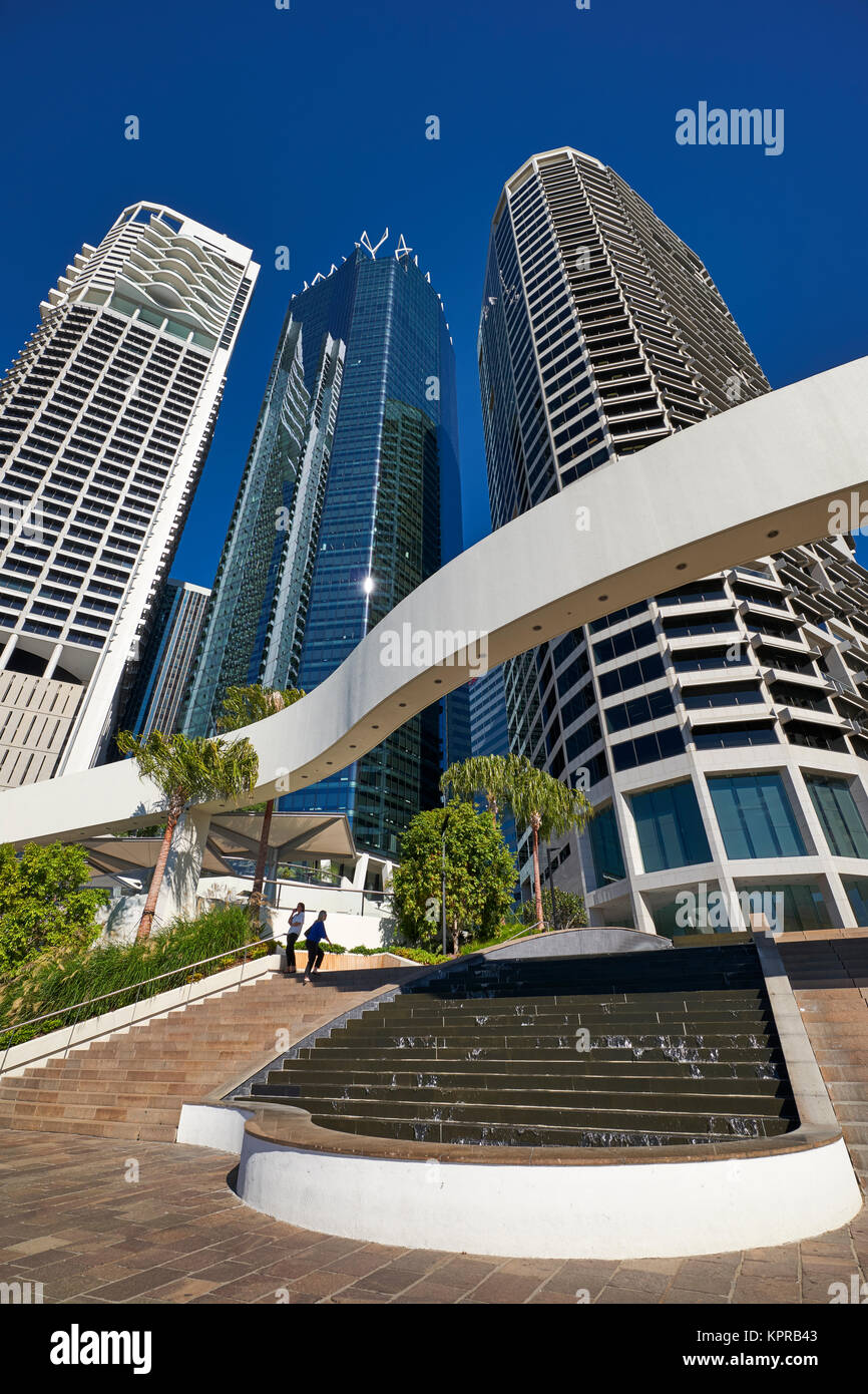 Modern high-rise buildings at Eagle Street Pier beside river in ...