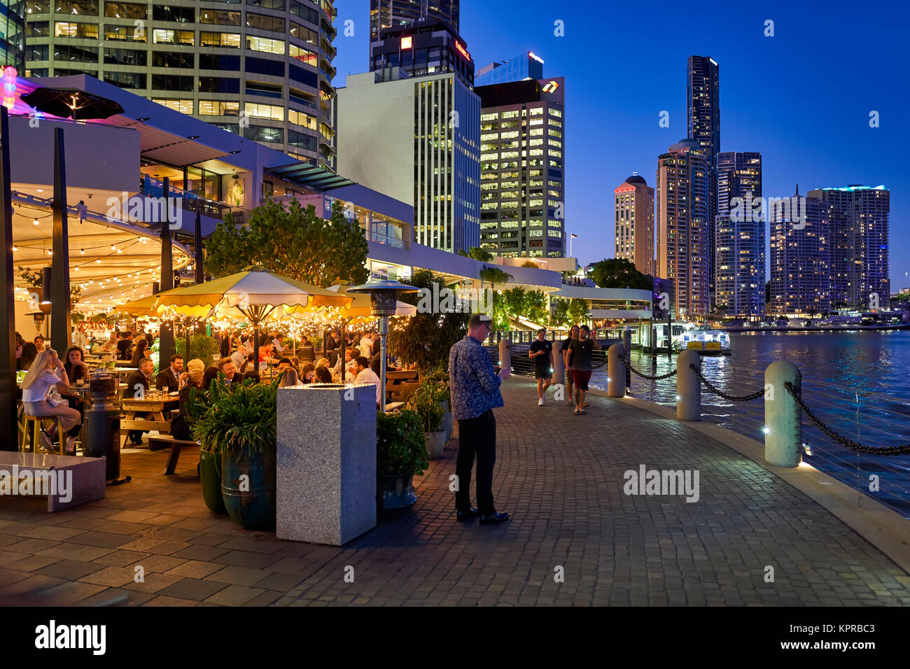 Brisbane riverfront at Eagle Street pier at dusk. Queensland, Australia ...