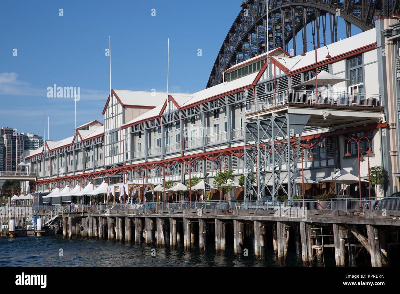 Walsh Bay wharf in Sydney with the harbour bridge,Sydney Stock Photo ...
