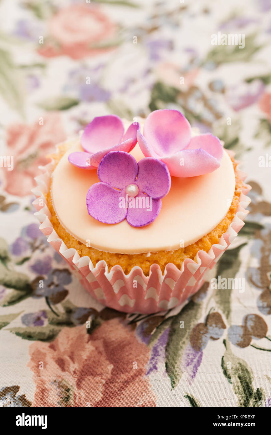 Cupcake with flowers Stock Photo - Alamy